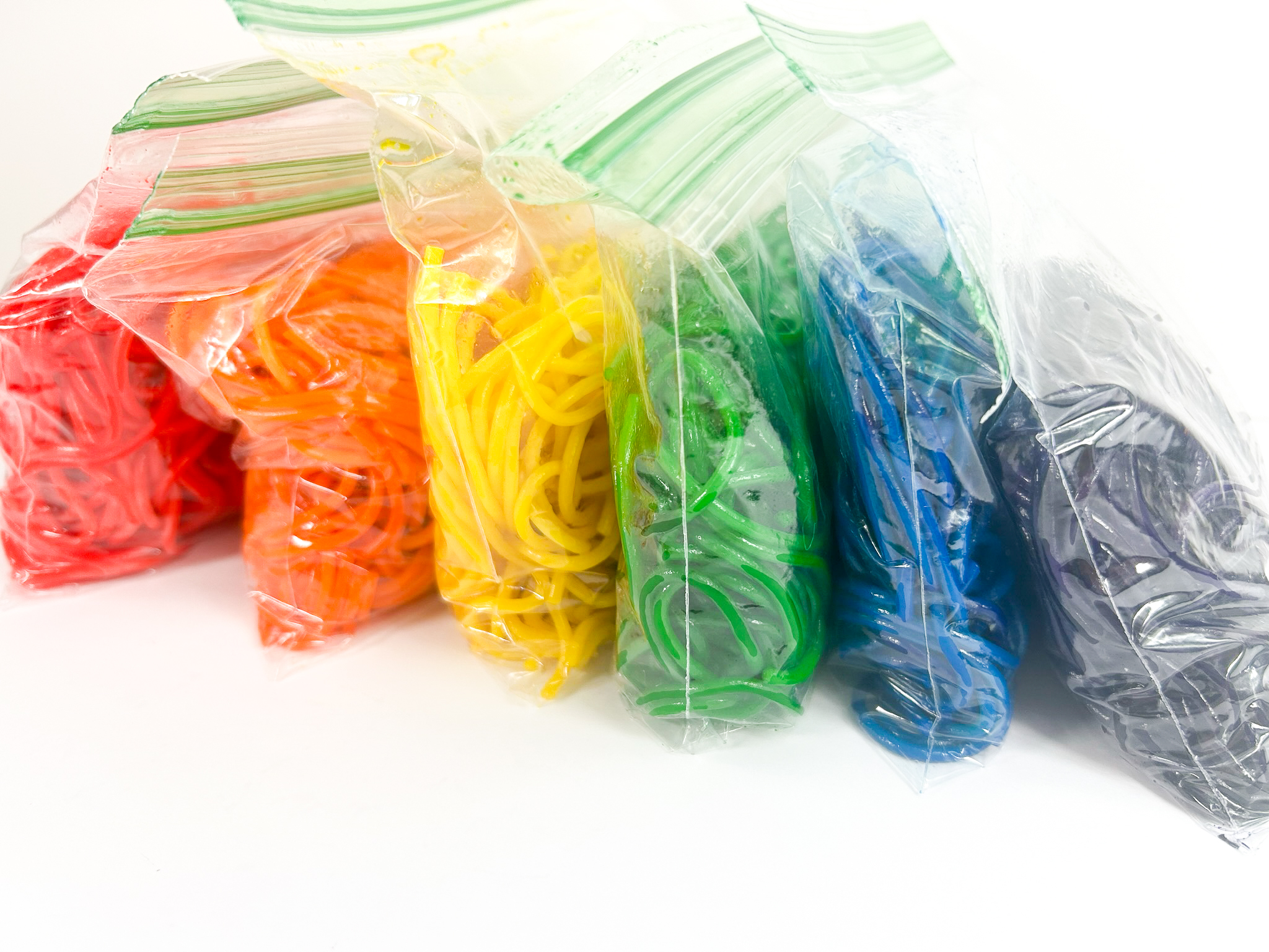 Easy DIY Rainbow Spaghetti Noodles For Sensory Play - Made In A Pinch